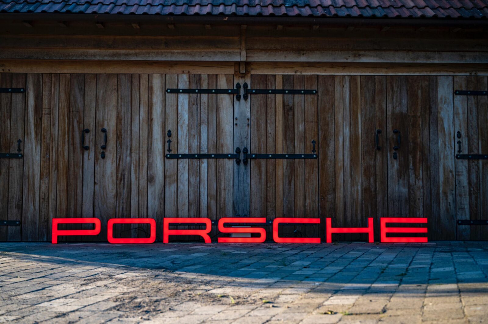 For Sale: An Illuminated Porsche Dealership Sign