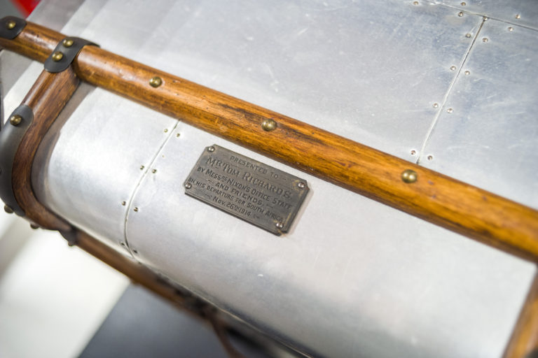 A Modern Aluminum Aircraft Desk With A Matching Cabinet