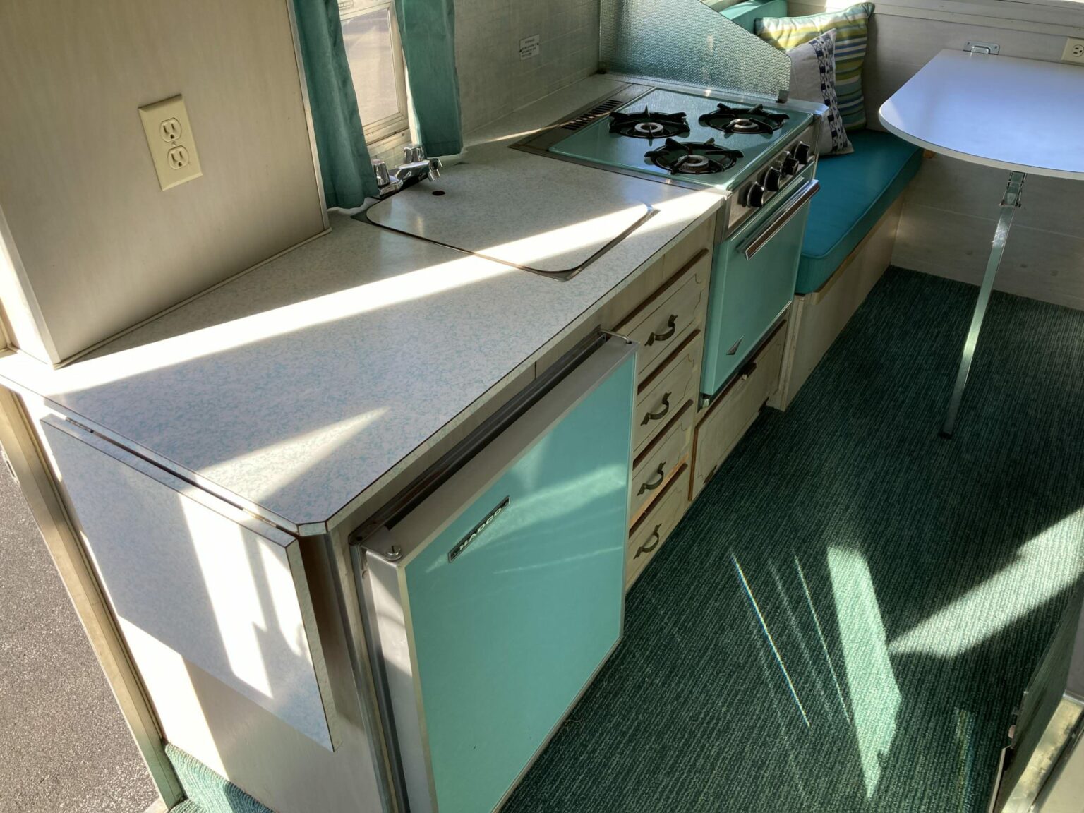 Retro 1960s Survivor: A Classic Winnebago F17 Camper