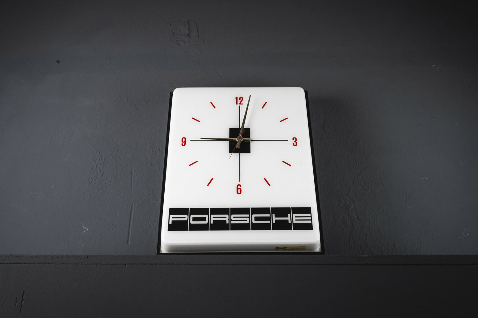A Retro Original 1970s Vintage Illuminated Porsche Wall Clock