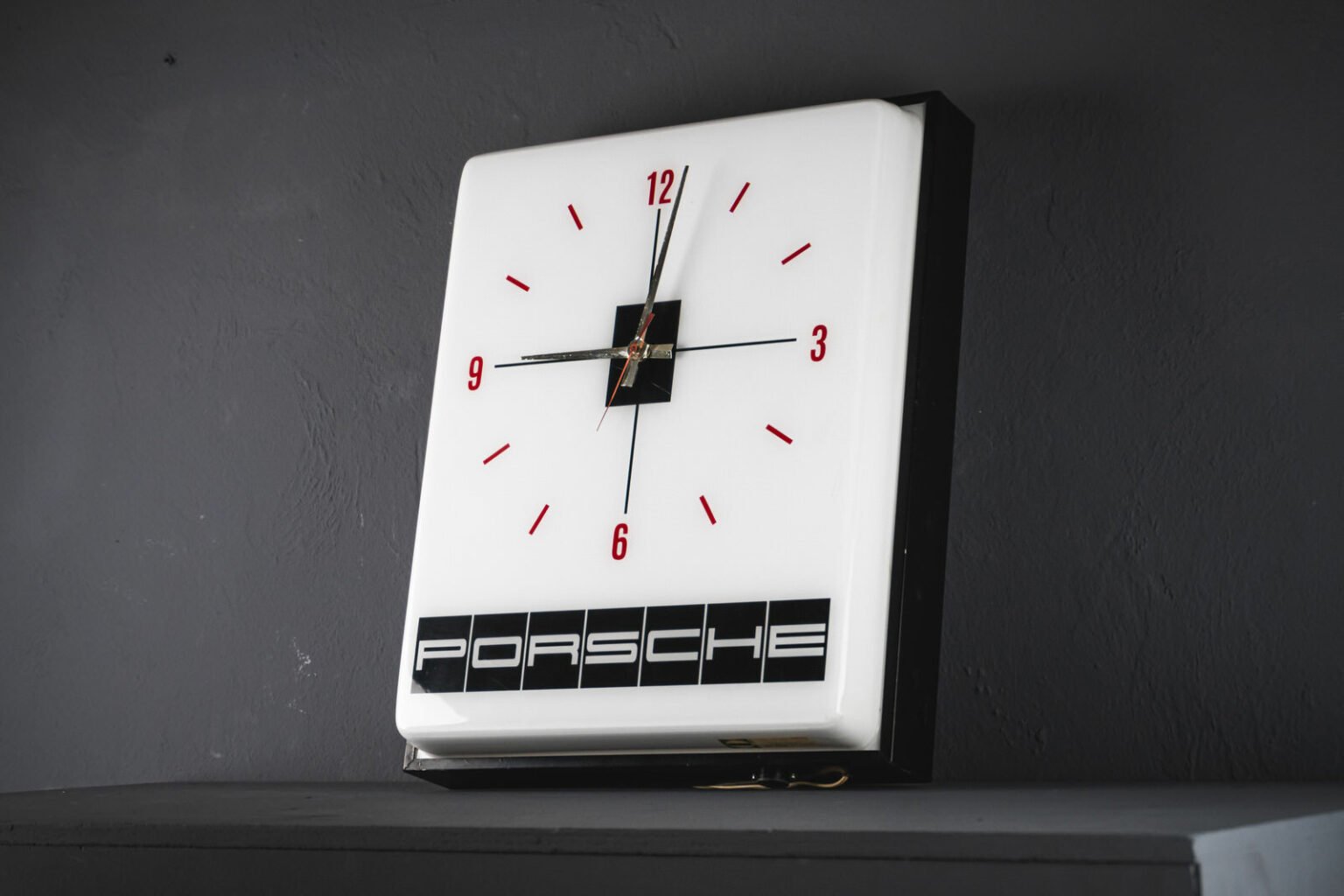 A Retro Original 1970s Vintage Illuminated Porsche Wall Clock
