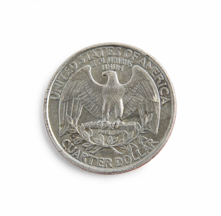 The Quarter Cutter™ – A Quarter With A Hidden Blade