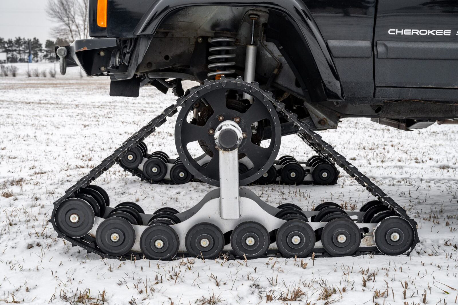 Winter Weapon For Sale: A Jeep Cherokee On A Dominator Track System