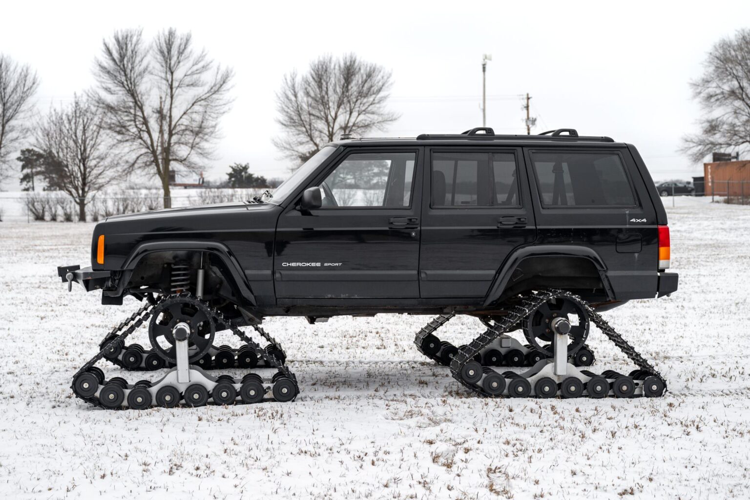 Winter Weapon For Sale: A Jeep Cherokee On A Dominator Track System